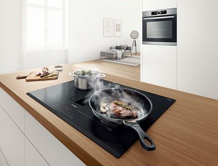 Cooking and baking with modern Bosch home appliances.