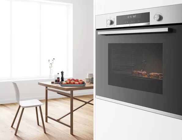 Cooking and baking with modern Bosch home appliances.